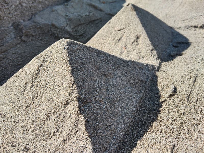 Pyramids of Egypt by Sand Artist. Stock Photo - Image of news, books ...