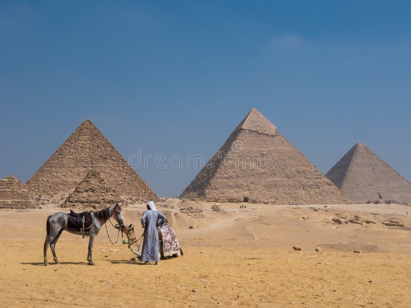 The Pyramids of Giza in Cairo, Egypt Stock Photo - Image of desert ...