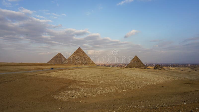 Pyramids of Giza with Giza City View Background Stock Photo - Image of ...