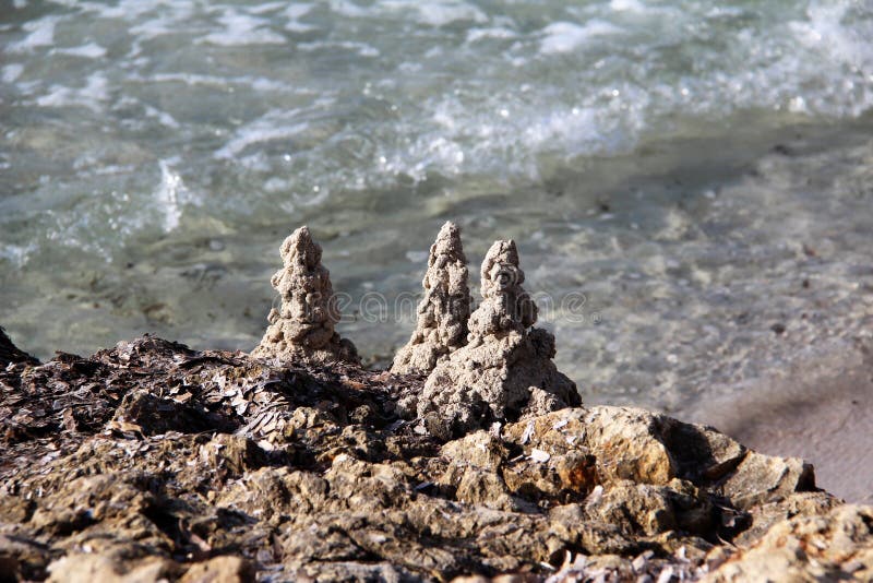 Beach Sand. Pyramids Made from Beach Sand Stock Photo - Image of ...