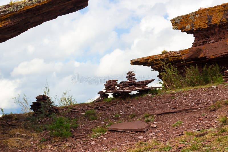 Pyramids of Stones on the Background of Mountains Stock Photo - Image ...