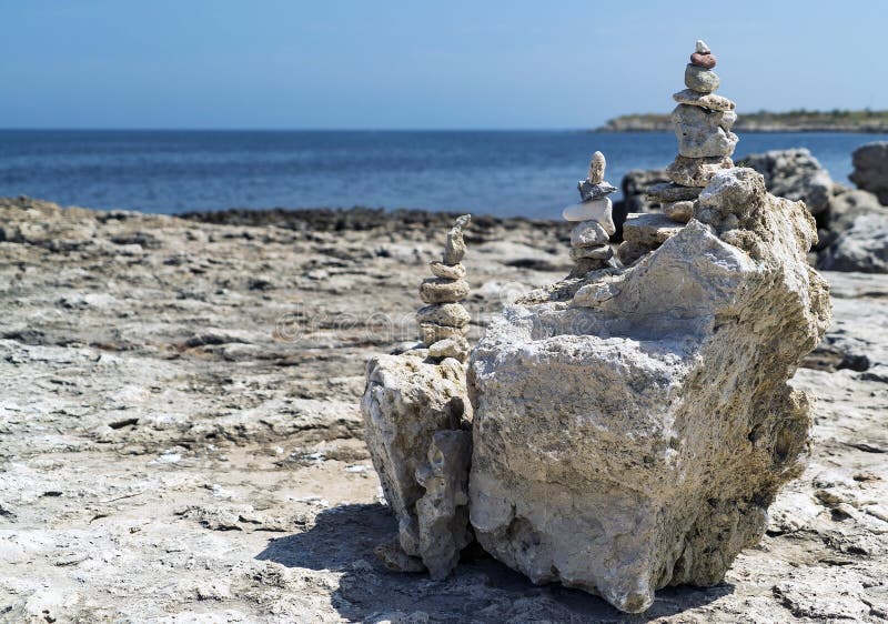 Pyramids of Stones on the Stone Coast of the Black Sea . Crimea Stock ...