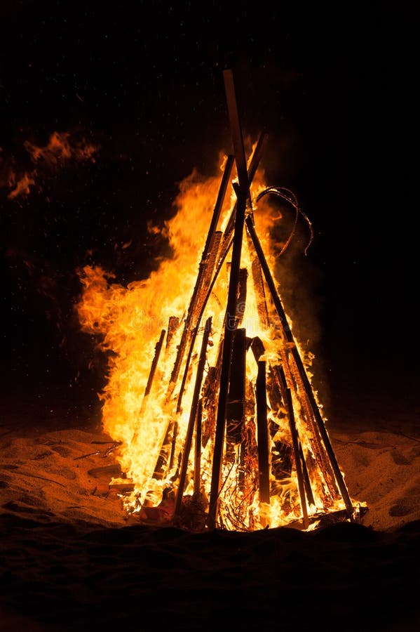 Pyre burning on the beach stock photo. Image of burnt - 39122990