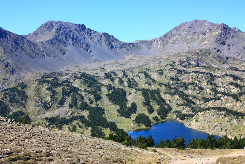 Pyrenees mountain and lake stock image. Image of peak - 6982425
