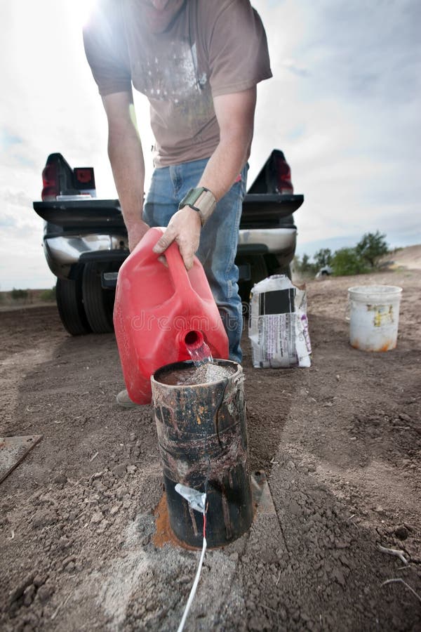 Pyrotechnic Worker Pouring Gasoline Stock Photo - Image of alone ...