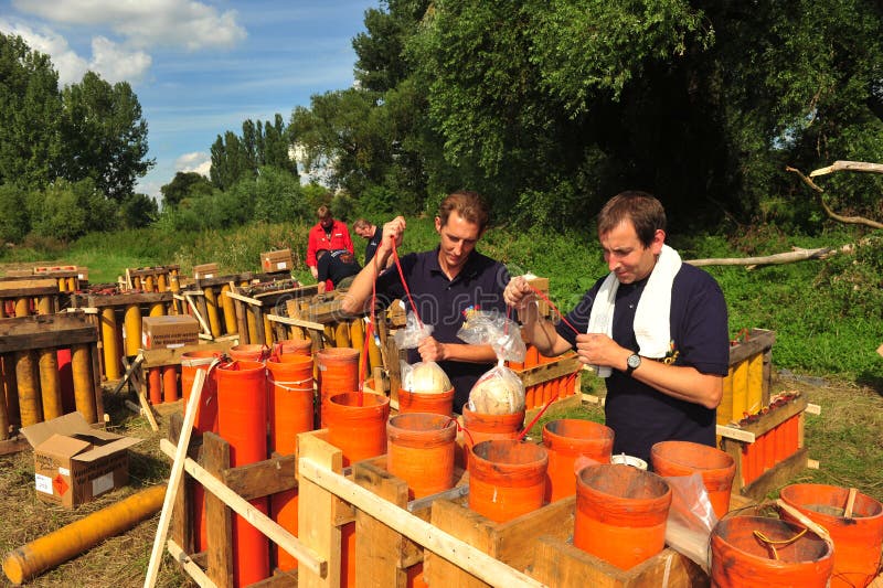 Pyrotechnicians at work editorial photography. Image of burn - 79960772