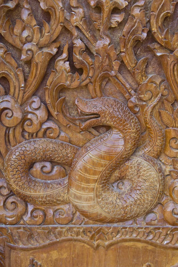 Snake on wood stock image. Image of architecture, famous - 29839105