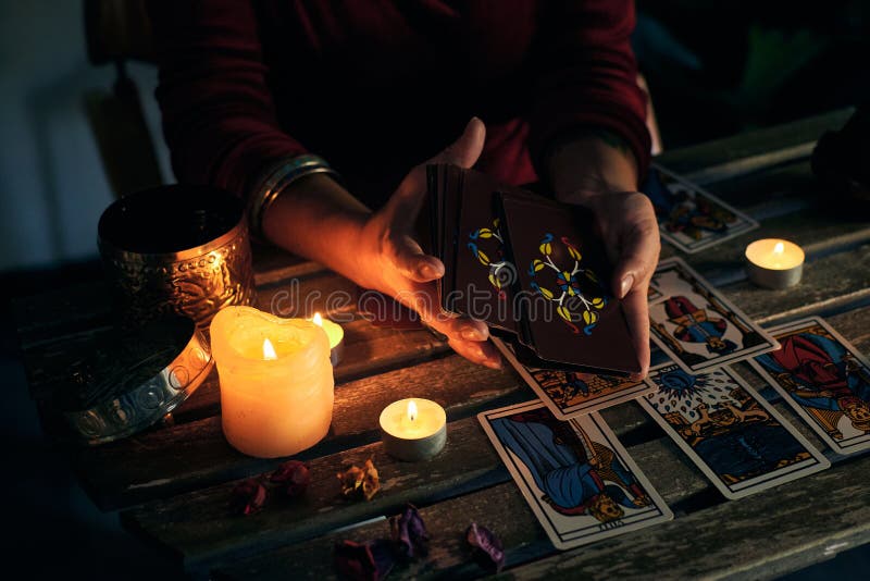 A Pythoness Shows Tarot Cards on a Wooden Table Stock Image - Image of ...