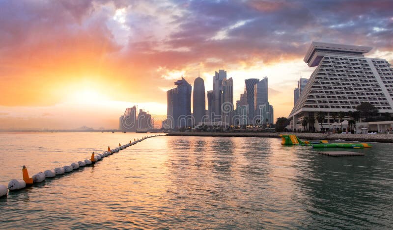 Doha skyline at sunset stock photo. Image of skyline - 23107372