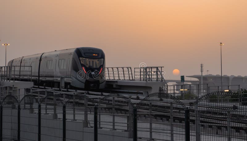 Qatar Red Line Metro Traveling through the Bridge Editorial Photo ...