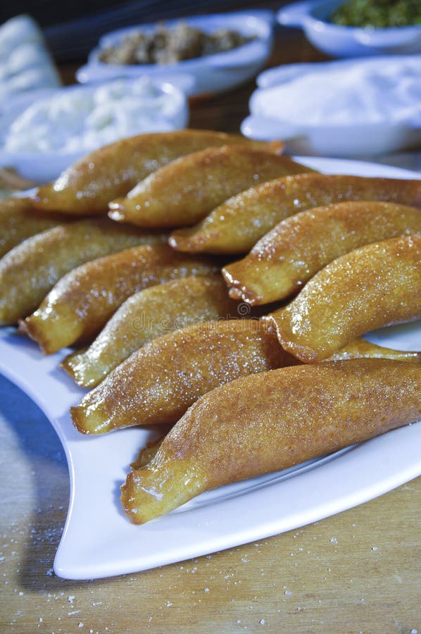 Qatayef or Katayef, Arabic Sweets with Nuts for Ramadan and Eid Stock ...