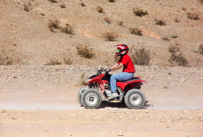 Quad ATV Rider in Desert stock photo. Image of horizontal - 3962200