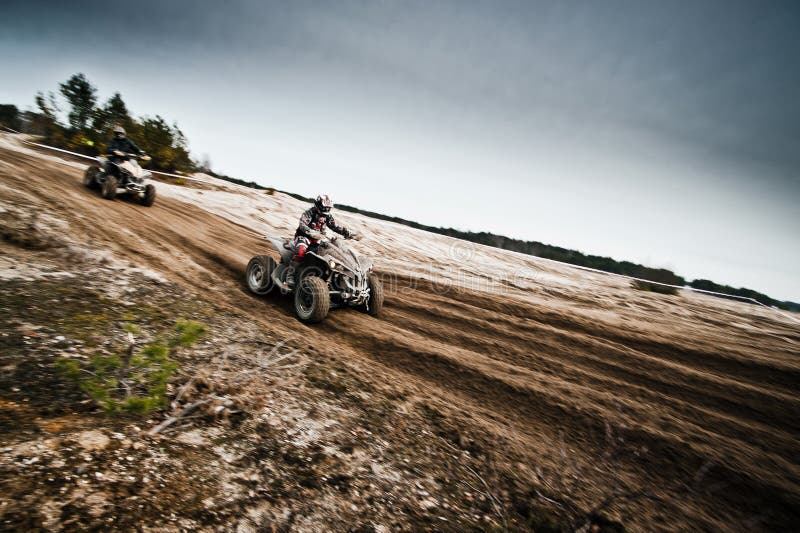 Red atv on highlands- quad stock image. Image of terrain - 6511505