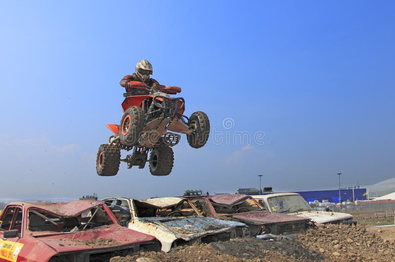 Two atv jumpers stock image. Image of leisure, clouds - 13192247