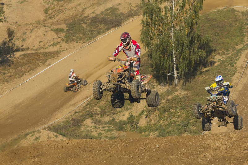 Quad jumpers editorial photo. Image of race, male, person - 21281206