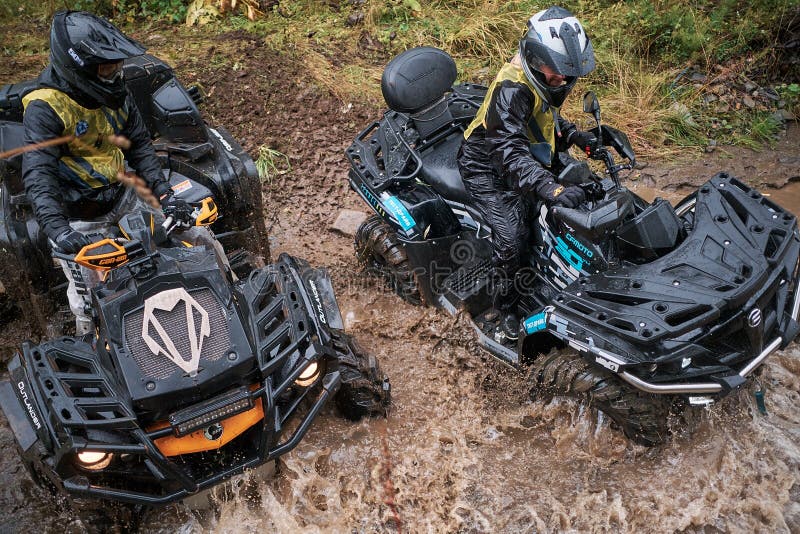 Quad Rider Jumping on a Muddy Forest Trail Editorial Photography ...
