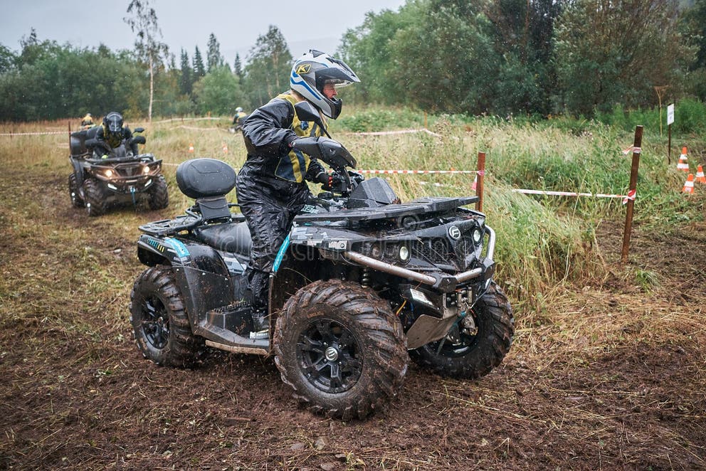 Quad Rider Jumping on a Muddy Forest Trail Editorial Photo - Image of ...