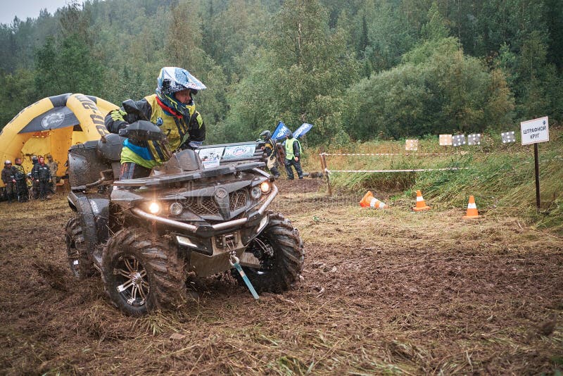 Quad Rider Jumping on a Muddy Forest Trail Editorial Photo - Image of ...