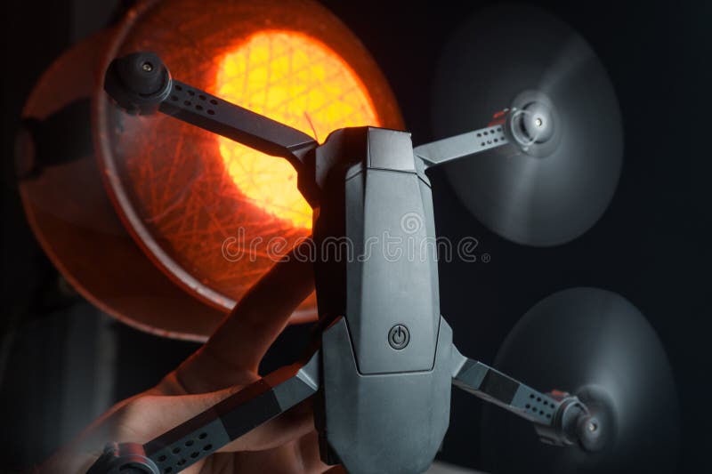 Quadcopter in a Dark Room Illuminated by Red Light Stock Image - Image ...