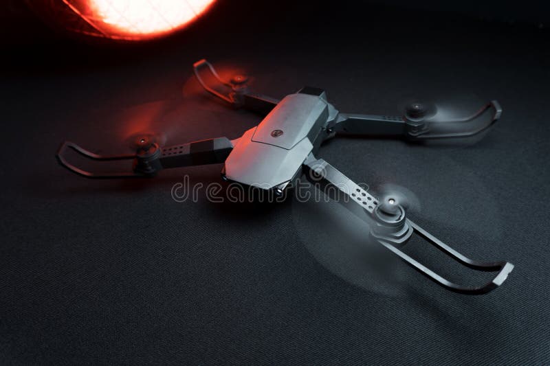 Quadcopter in a Dark Room Illuminated by Red Light Stock Image - Image ...
