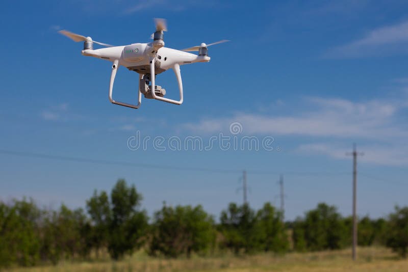 Quadrocopter Flying Over the Landscape Stock Image - Image of blue ...