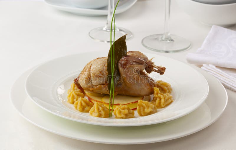 Quail cooked with apple stock photo. Image of herb, cuisine - 308548036