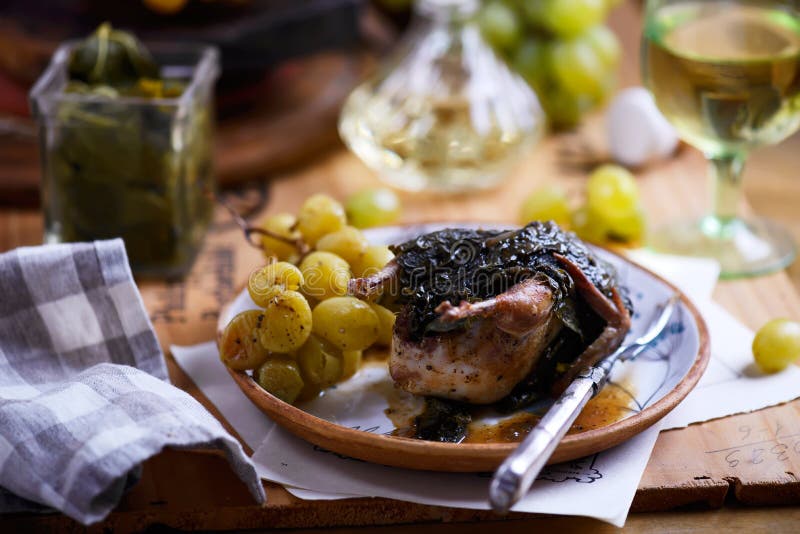Quail in Grape Leaves with Grapes.style Vintage Stock Photo - Image of ...