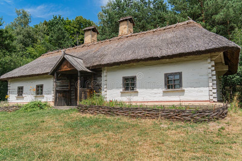 Quaint Old-world Cabin on an Elevated Patch in a Verdant Landscape ...