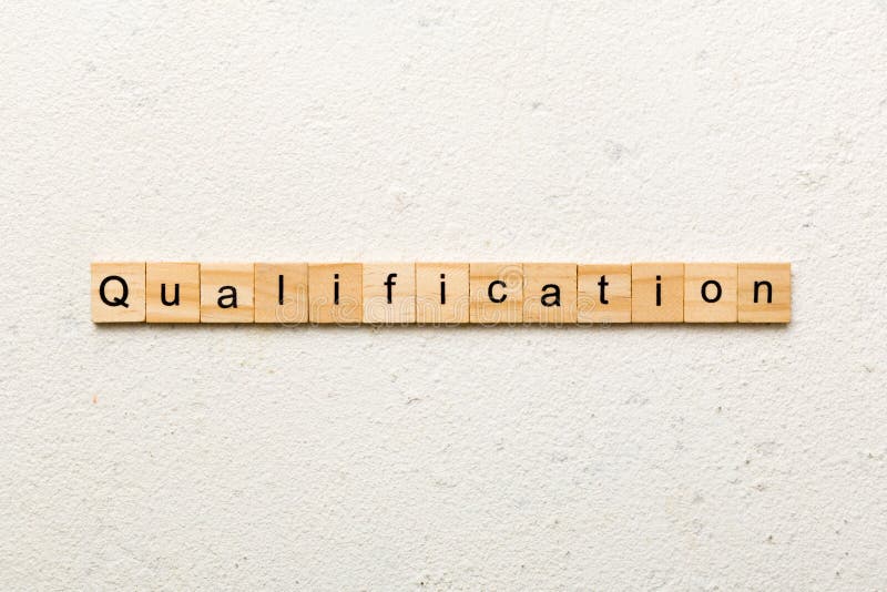 Qualification Word Written on Wood Block. Qualification Text on Table ...