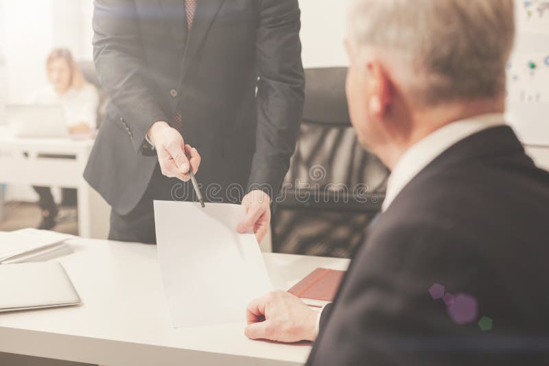 Qualified Attentive Worker Asking for Bosses Signature Stock Photo ...