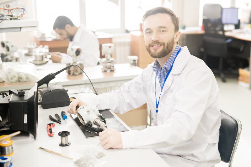 Qualified Lab Technician Analyzing Manometer in Workshop Stock Photo ...