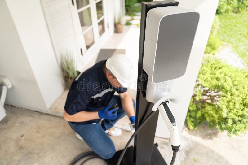 Qualified Technician Install Home EV Charging Station. Synchronos Stock Image - Image of home ...