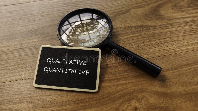 Qualitative and Quantitative Research with Magnifying Glass Stock Photo ...