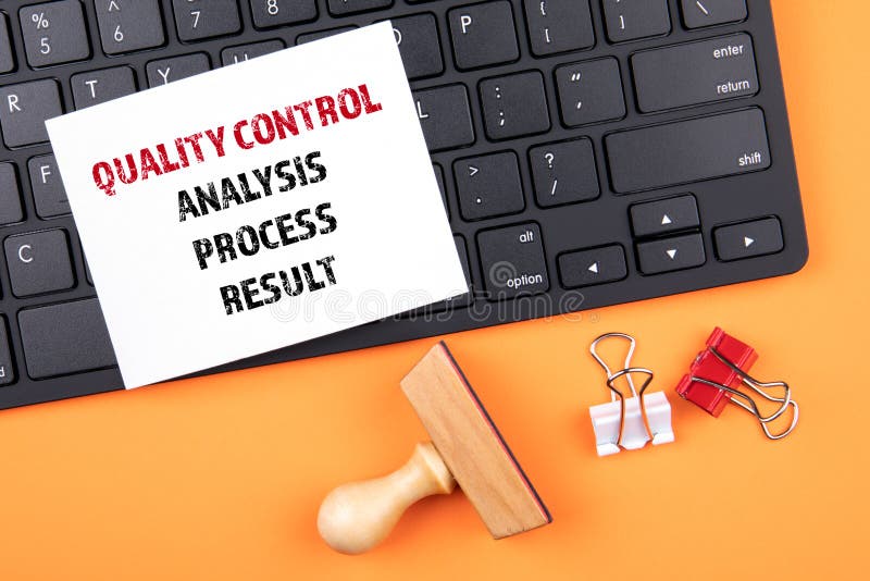 Quality Control Concept. Computer Keyboard on a White Office Table ...