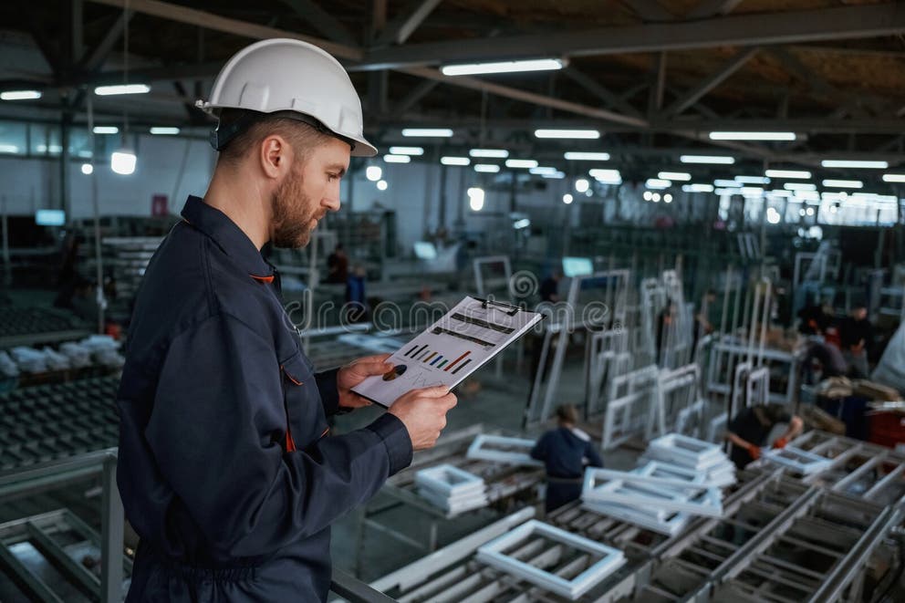 Quality Control. Factory Worker is Indoors with Hard Hat Stock Photo ...