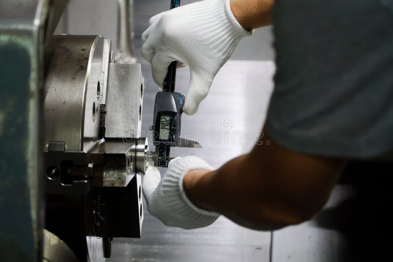 Quality Control Manufacturing.Hands of an Engineer Measures a Metal ...