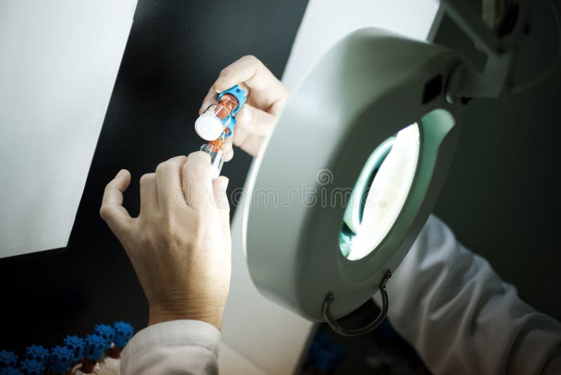 Quality Control of Medicine Stock Photo - Image of overlooking, vial ...