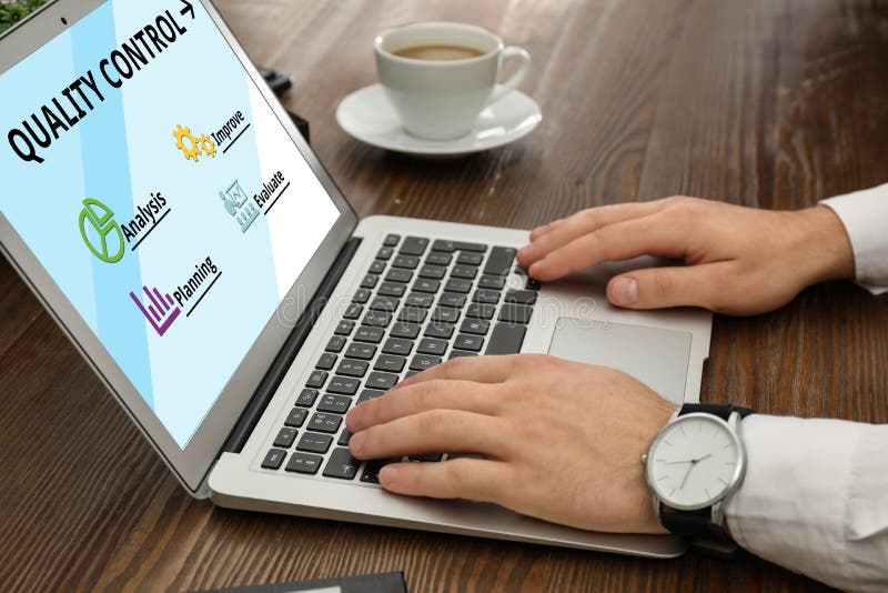 Quality Control Service. Man Using Laptop at Table Stock Image - Image ...