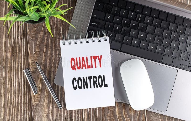 QUALITY CONTROL Text on Notebook with Laptop, Mouse and Pen Stock Photo ...