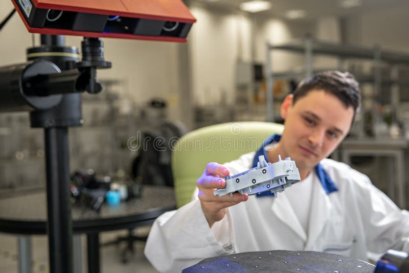 Quality Engineer Examines a Sample Scanned with a Laser on a 3d Scan in ...