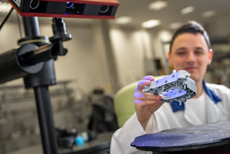 Quality Engineer Examines a Sample Scanned with a Laser on a 3d Scan in ...