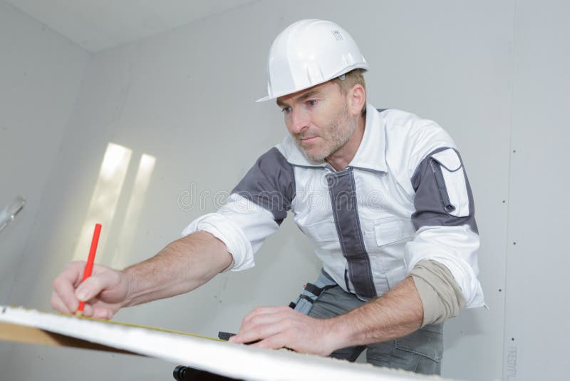 Quality good worker stock image. Image of material, builder - 174012083