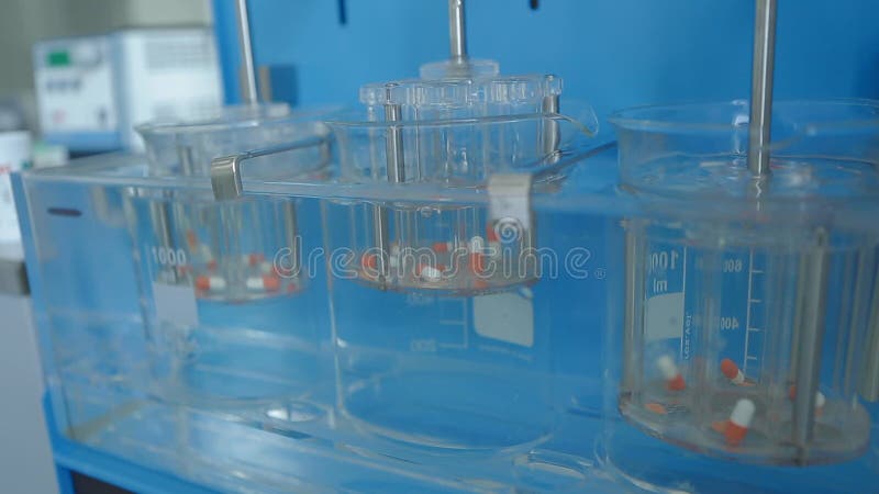 Dissolution Apparatus Testing Medication Pills Stock Footage - Video of ...