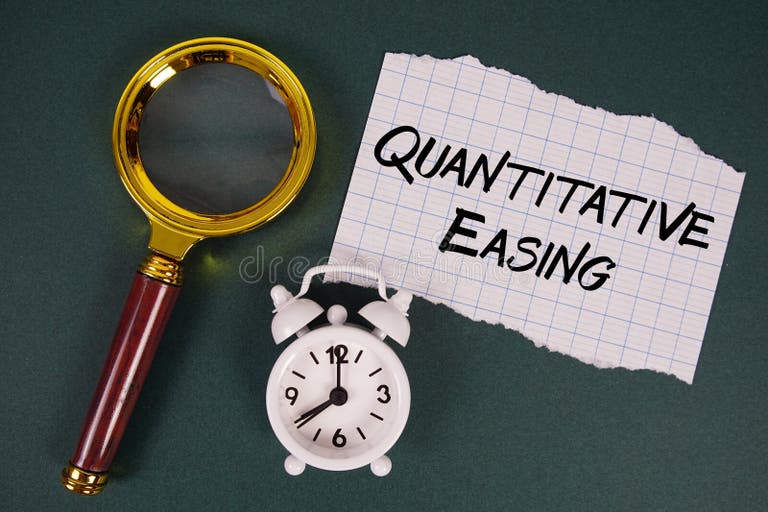 Quantitative Easing Text Written on Paper with Magnifying Glass and ...