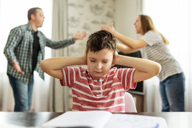 A Quarrel between Parents in Presence of Upset Child Stock Image ...
