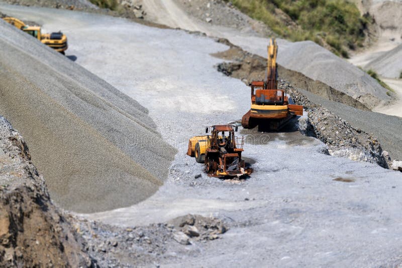 Quarry and bulldozers stock image. Image of land, strength - 54589299