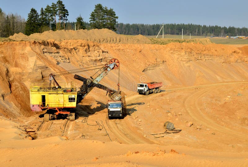 Quarry Excavator Loading Sand or into Dump Truck at Opencast Stock ...