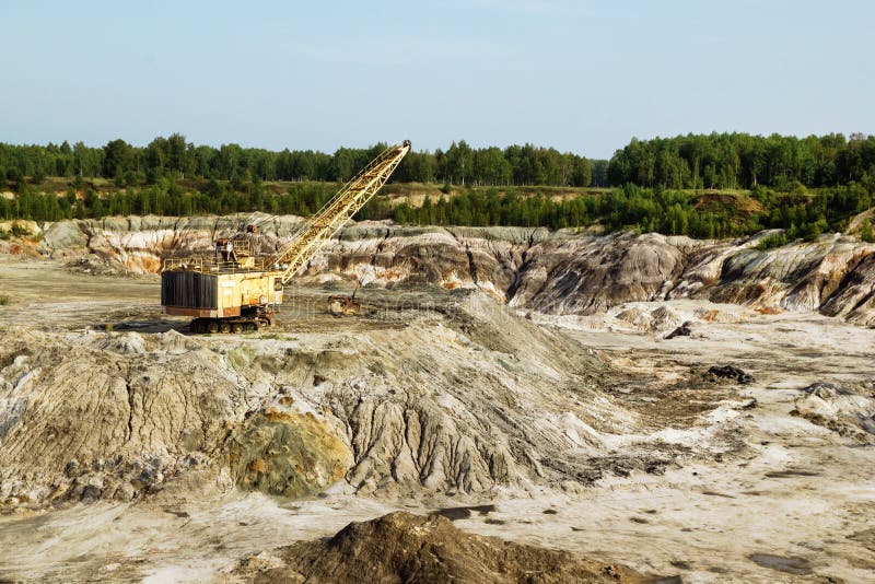 Quarry for the Extraction of Clay with Excavator. Stock Image - Image ...