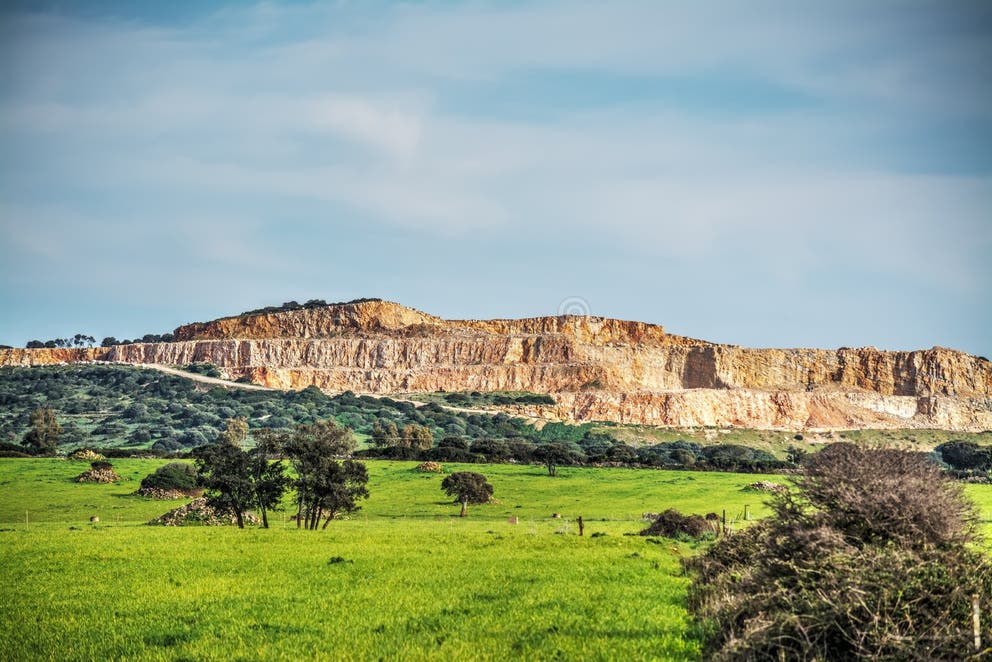 Quarry in a Green Landscape Stock Image - Image of excavator, blue ...