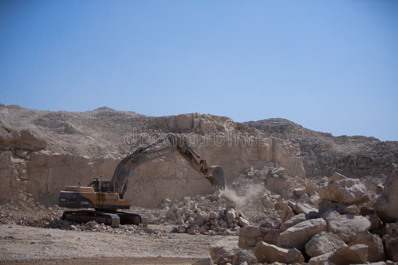 Quarry Mining Excavators Working on Breaking the Rocks Editorial ...